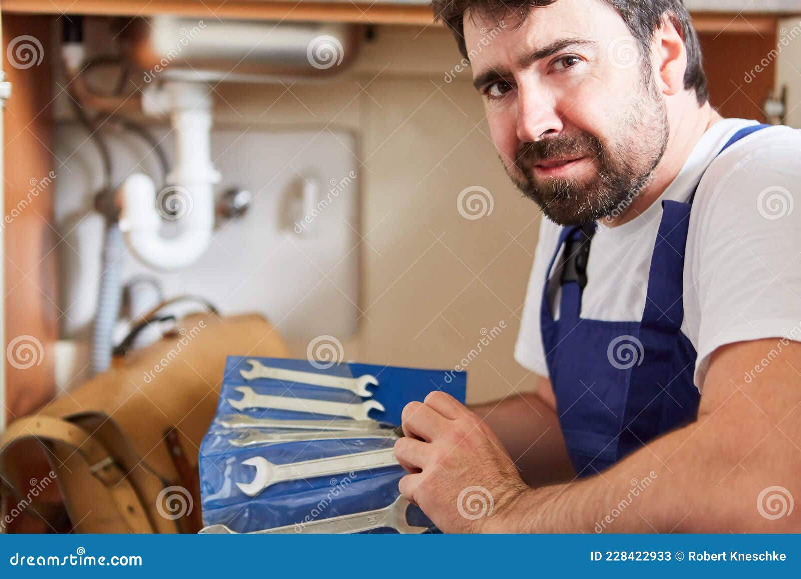 Handyman man with wrenches stock image. Image of challenge - 228422933