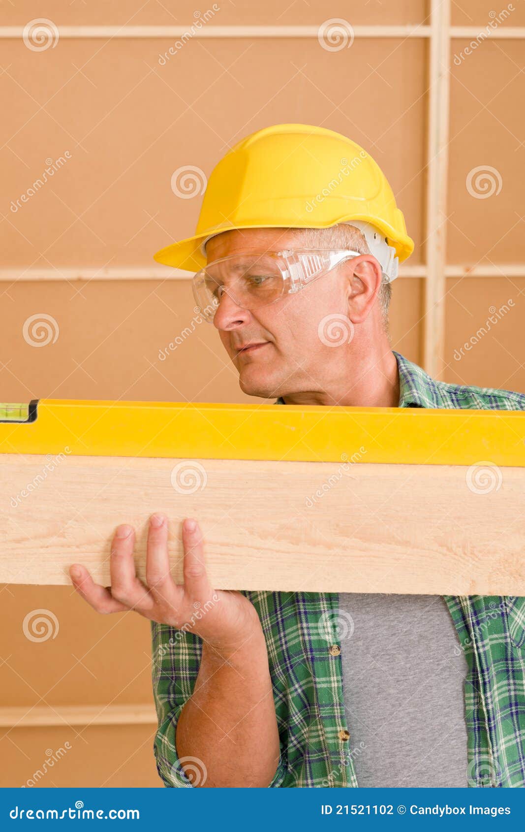 Handyman Mature Professional with Spirit Level Stock Photo - Image of ...