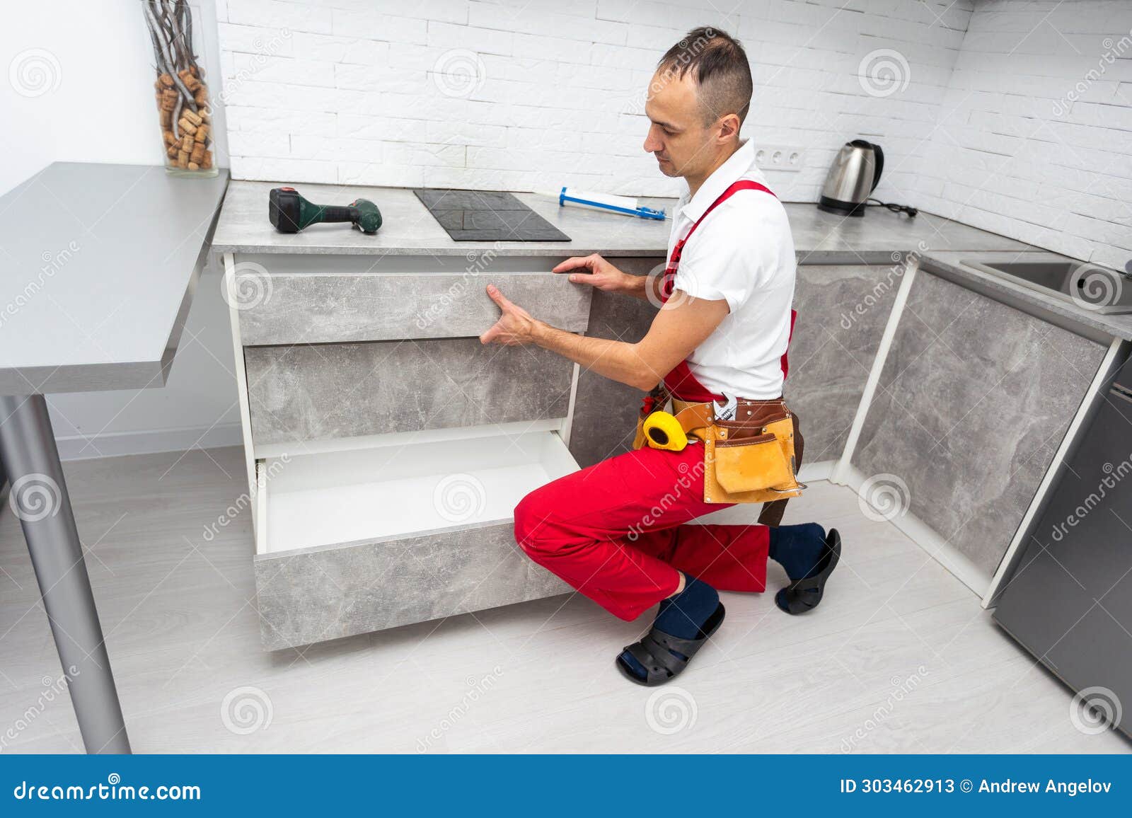 Handyman Measuring Shelf in the Kitchen Stock Photo Stock Image - Image ...