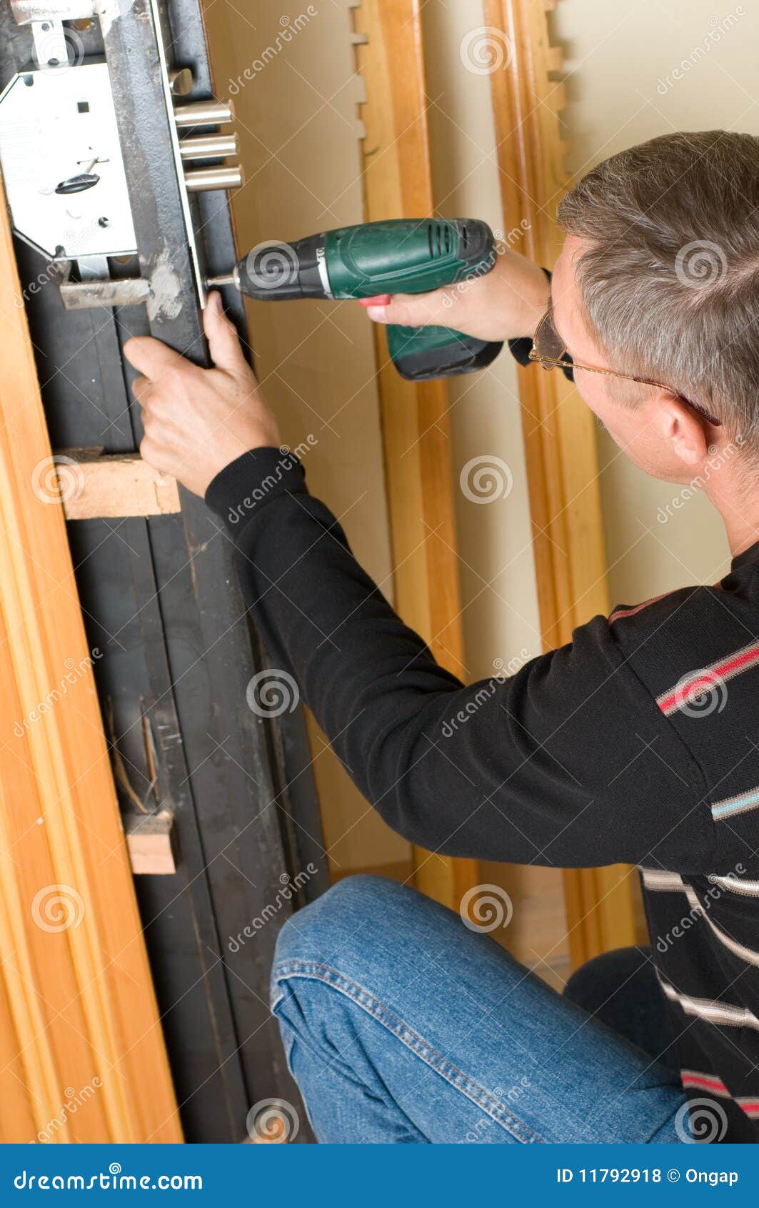 Handyman repairing lock stock photo. Image of metal, protection - 11792918