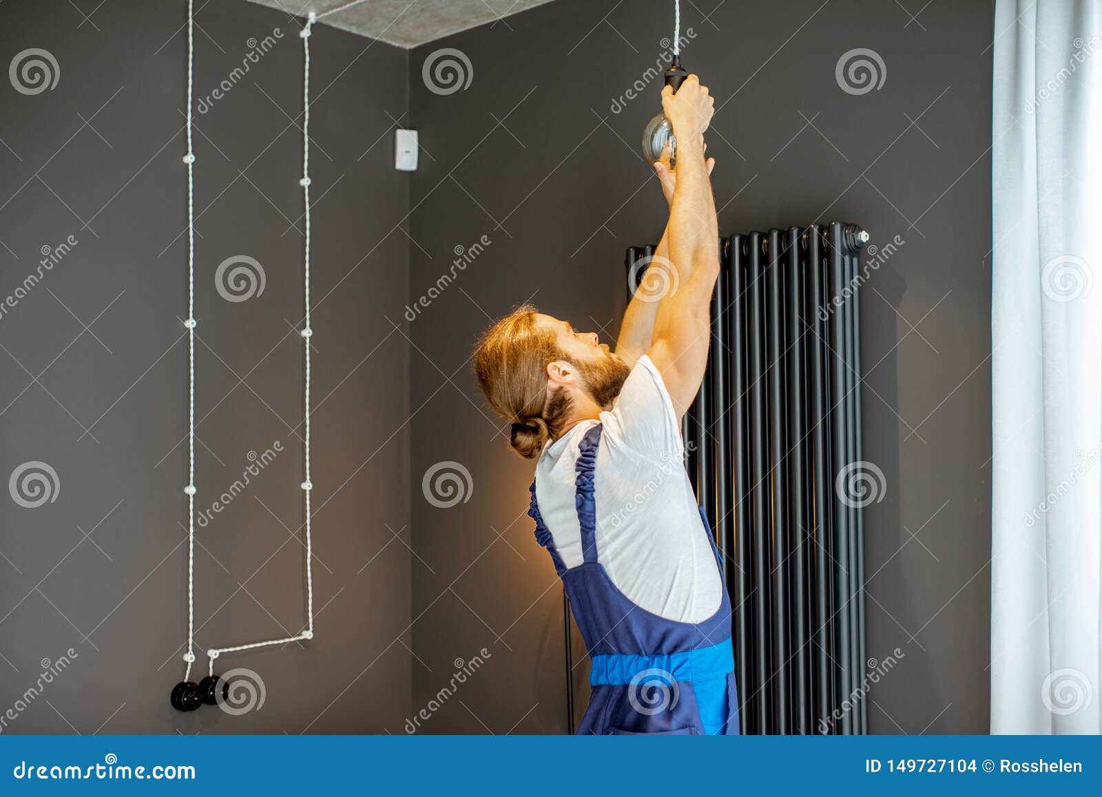 Handyman Replacing Lightbulb at Home Stock Photo - Image of people ...
