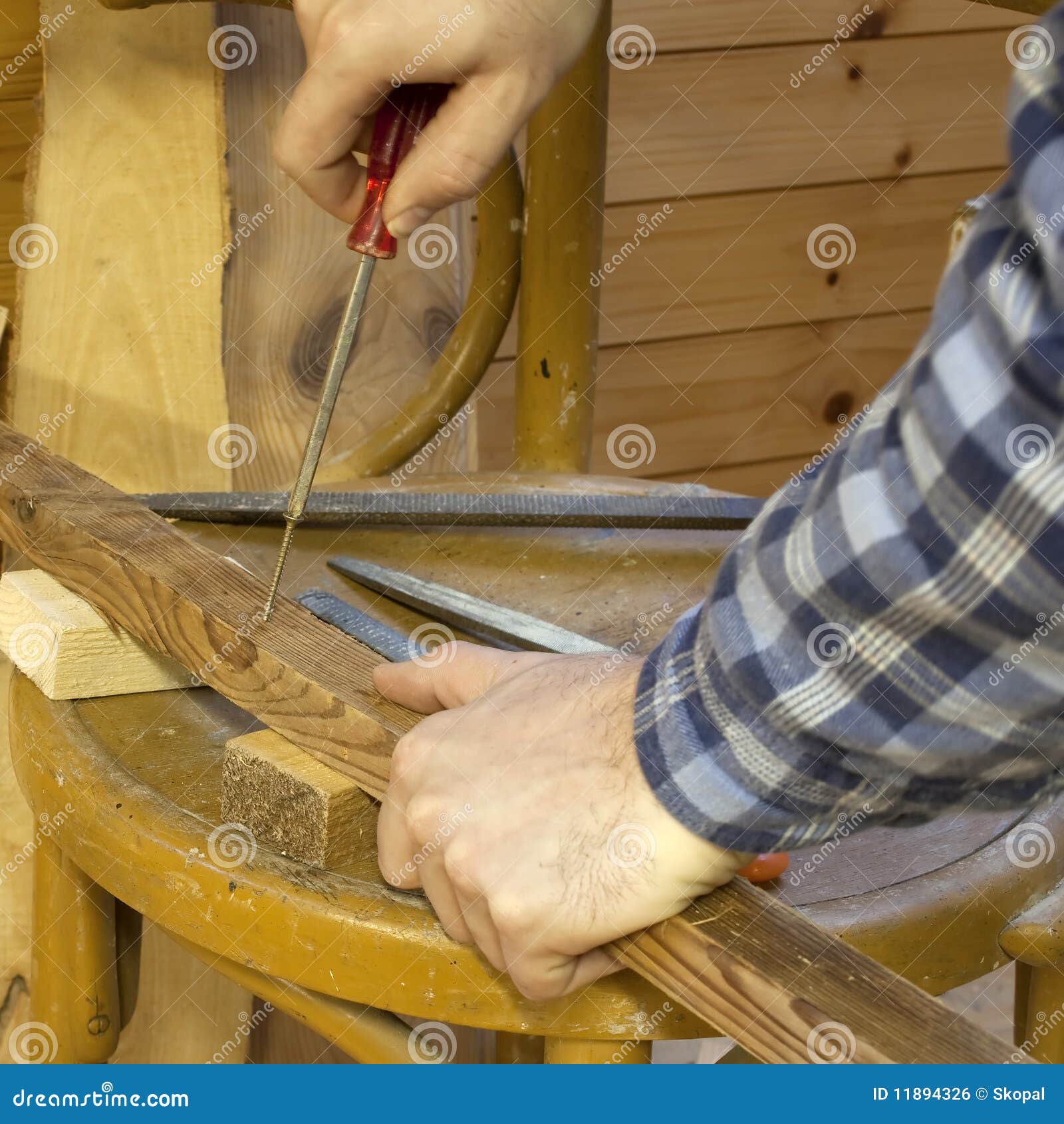 Handyman with screwdriver stock photo. Image of garage - 11894326