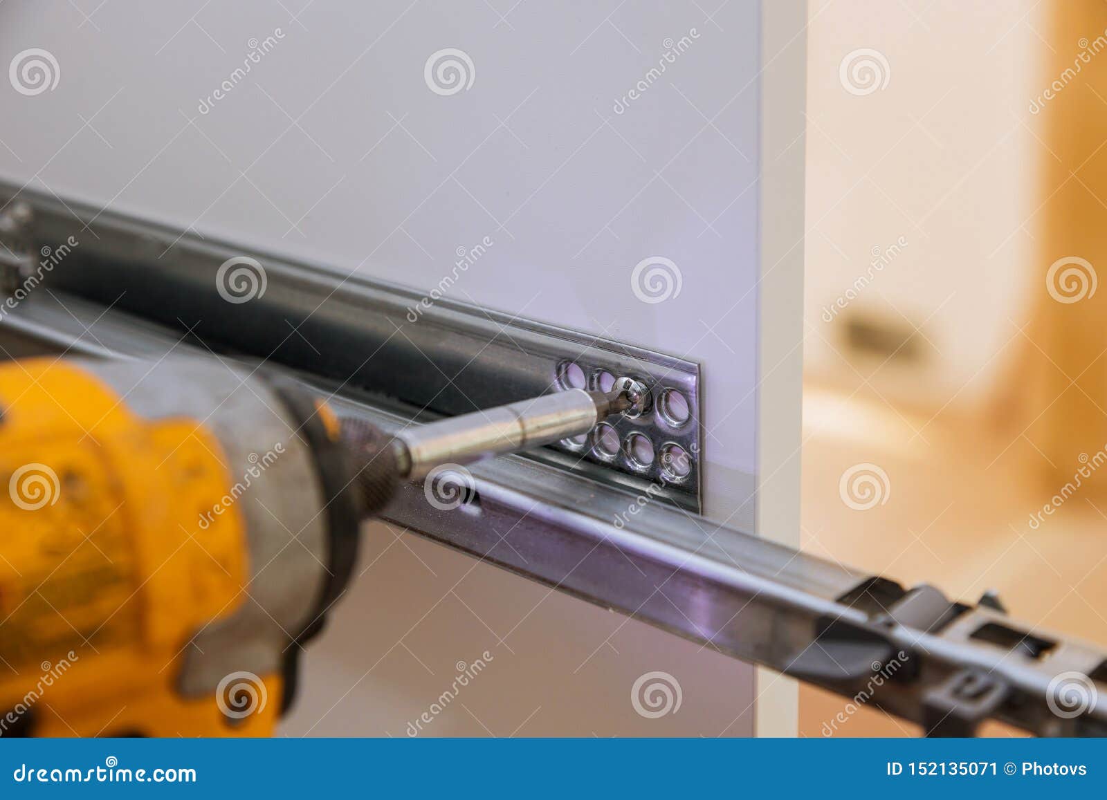 Handyman Service In The Process Of Assembling Furniture Kitchen Closets