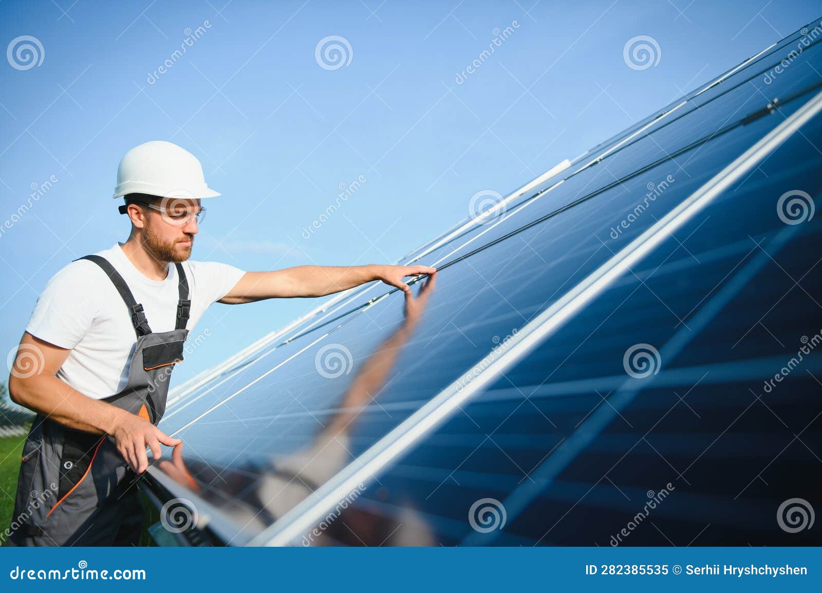 A Handyman Standing with Solar Panels. Stock Image - Image of ...