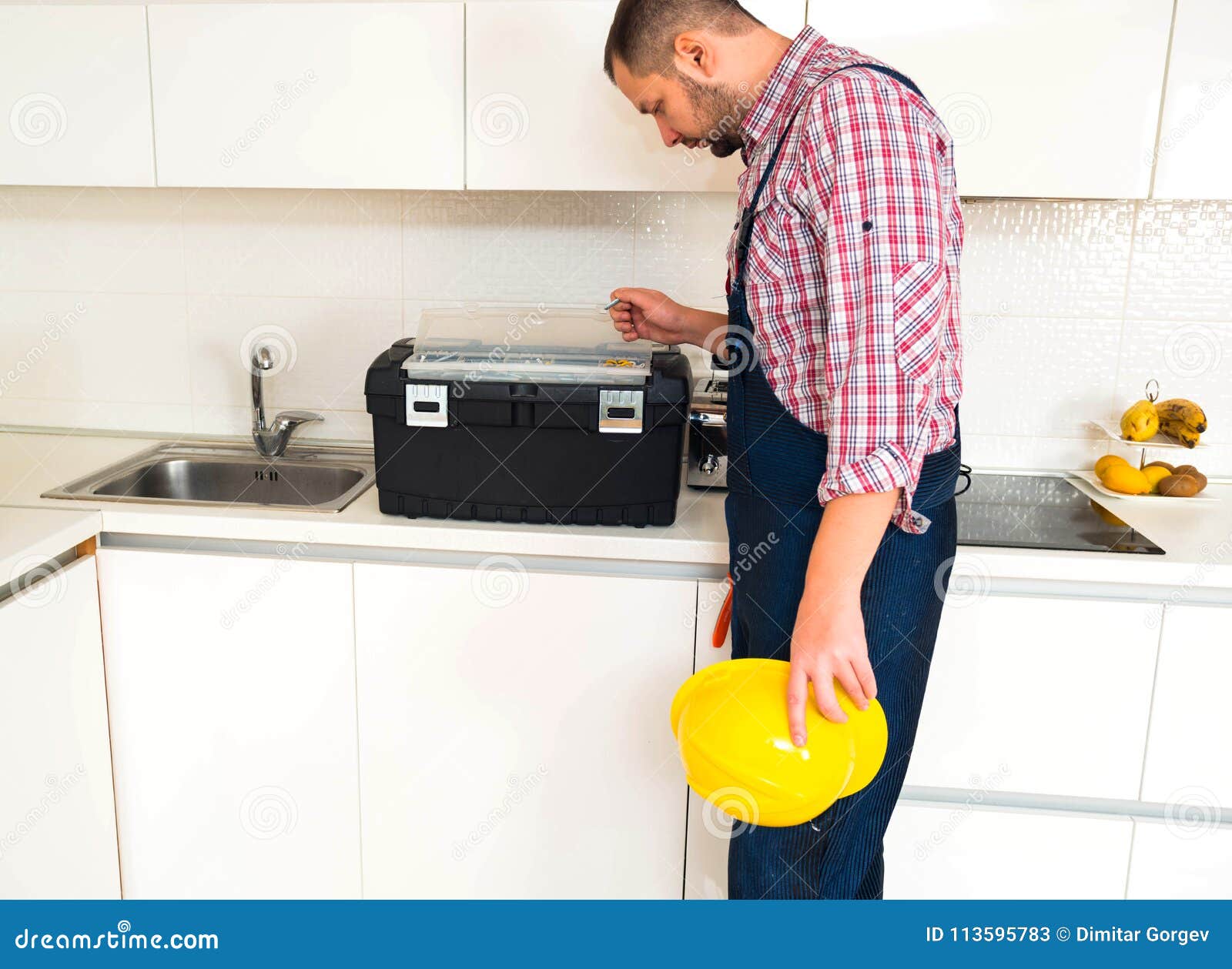 Handyman with Tools and a Hard Hat in the Kitchen Stock Image - Image ...