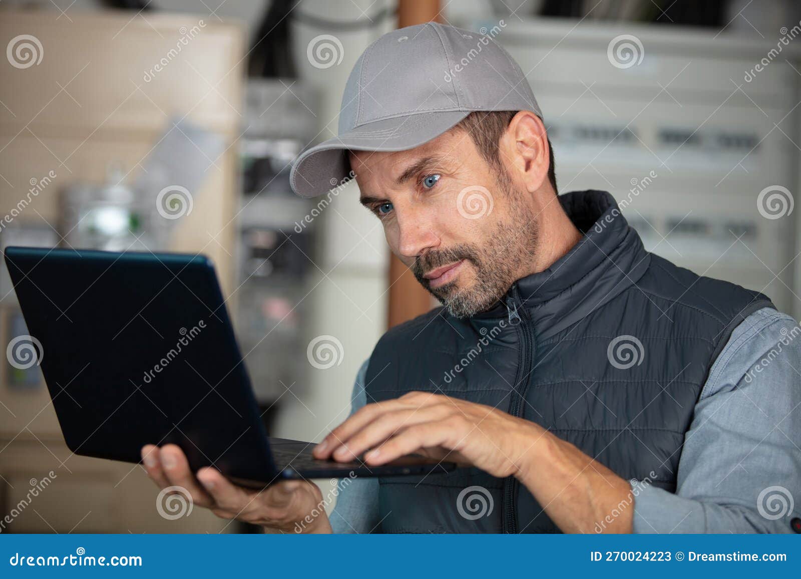 Handyman Using Portable Computer Stock Image - Image of internet ...