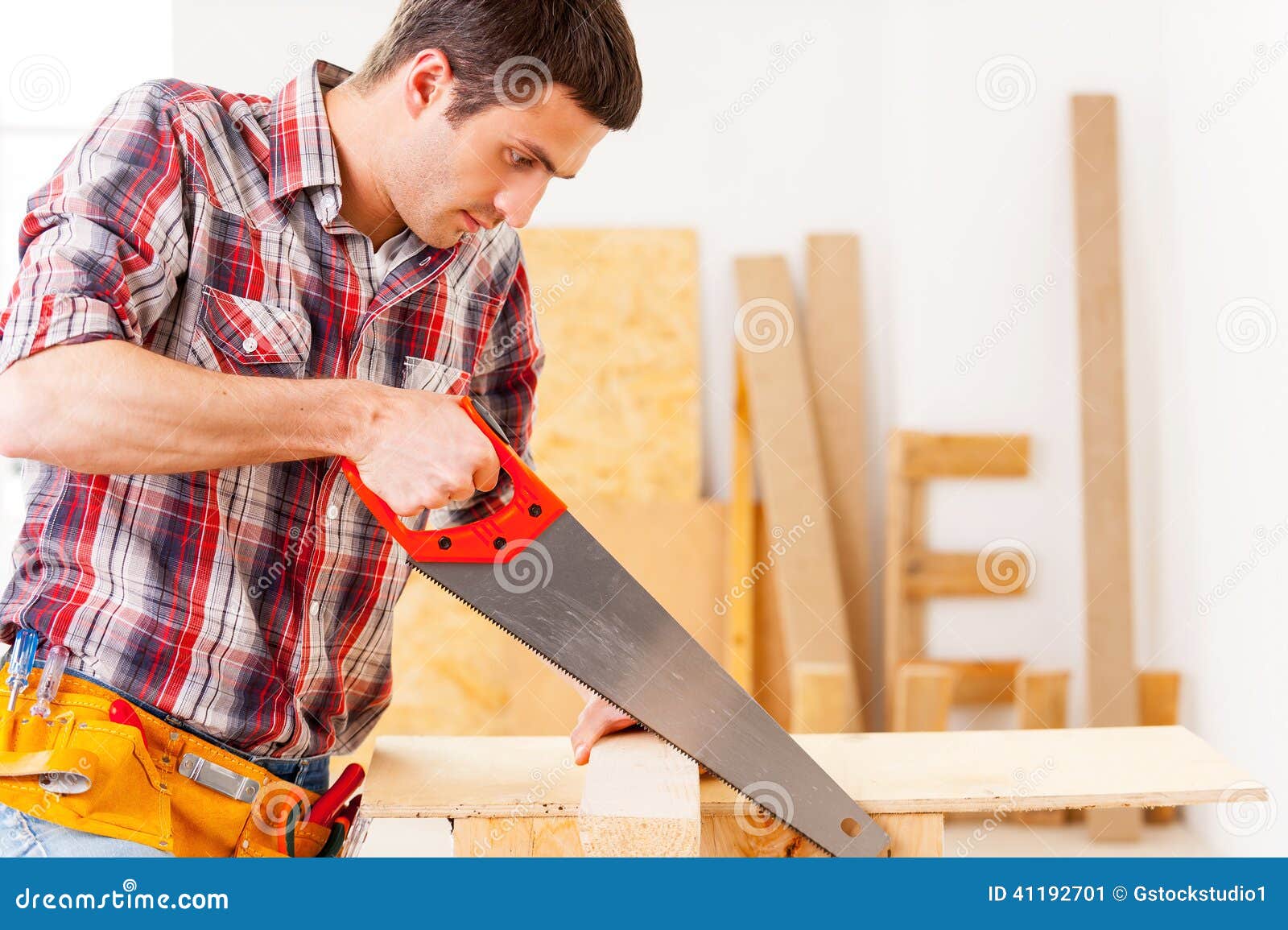 Handyman using saw. stock image. Image of industry, construction - 41192701