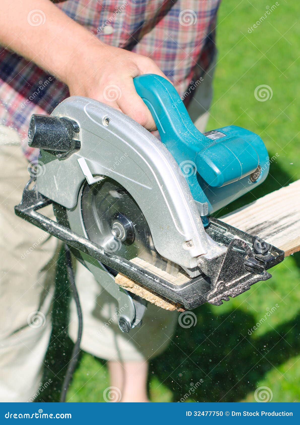 Handyman using saw mashine stock photo. Image of outdoors - 32477750