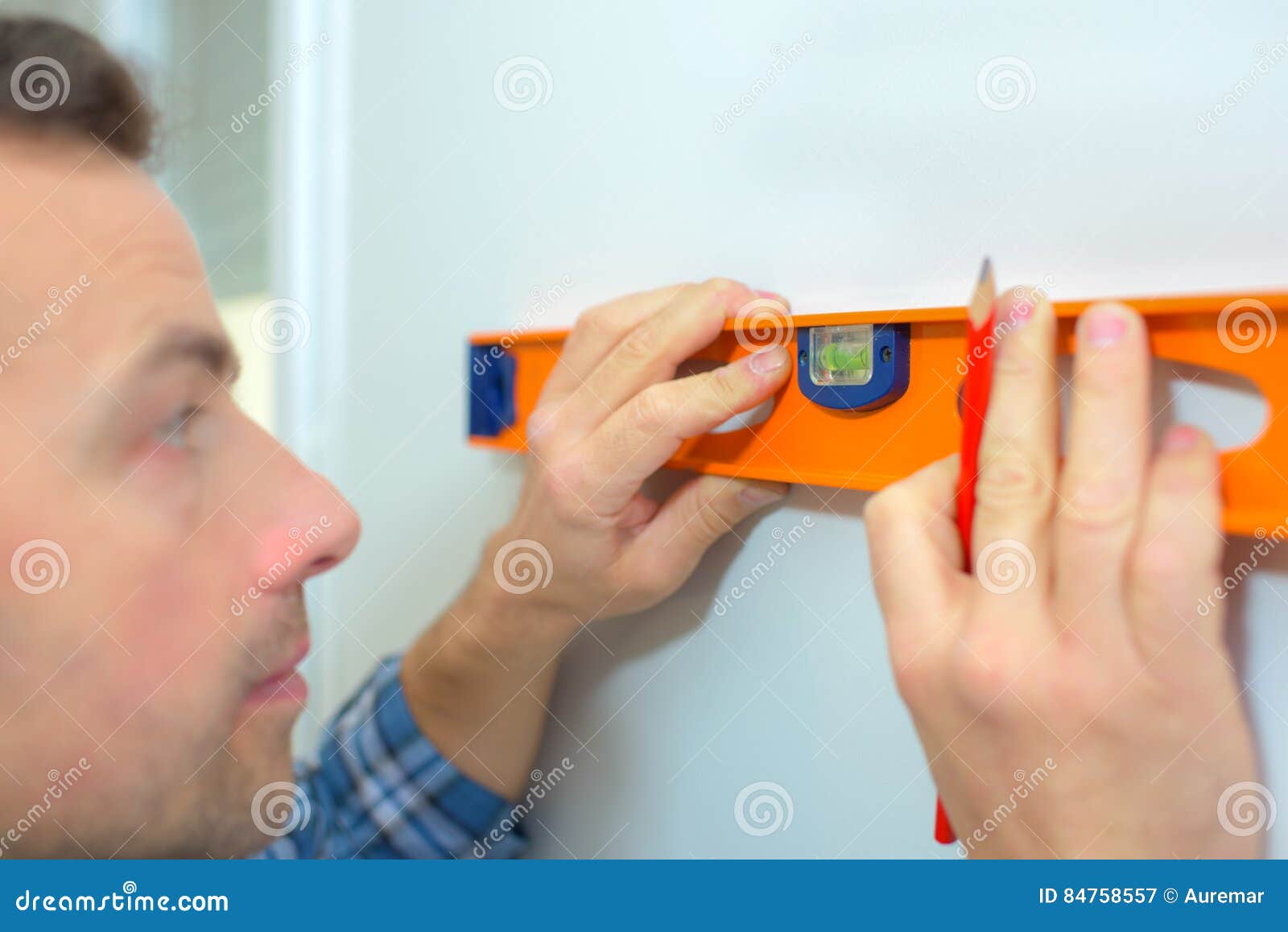 Handyman Using Spirit Level Stock Image - Image of wall, site: 84758557