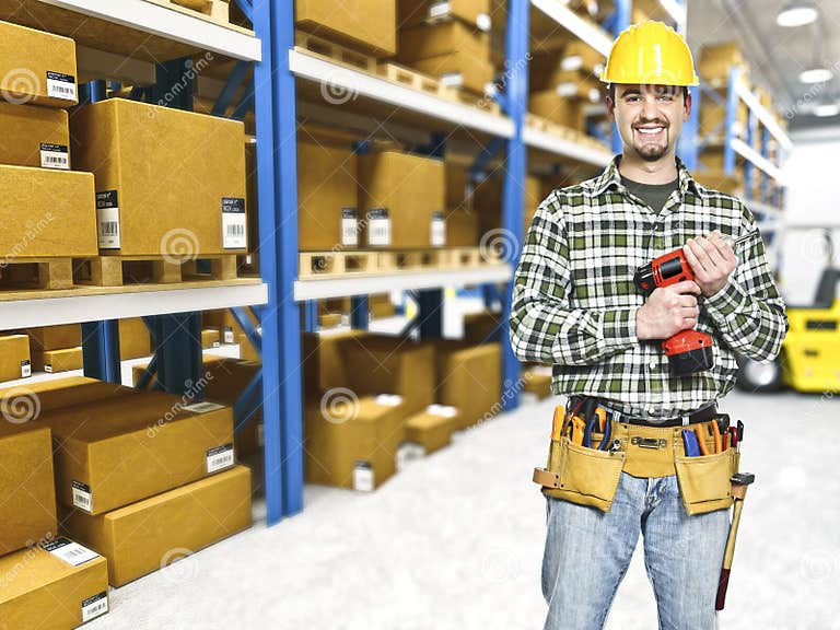 Handyman in warehouse stock image. Image of protective - 15459967