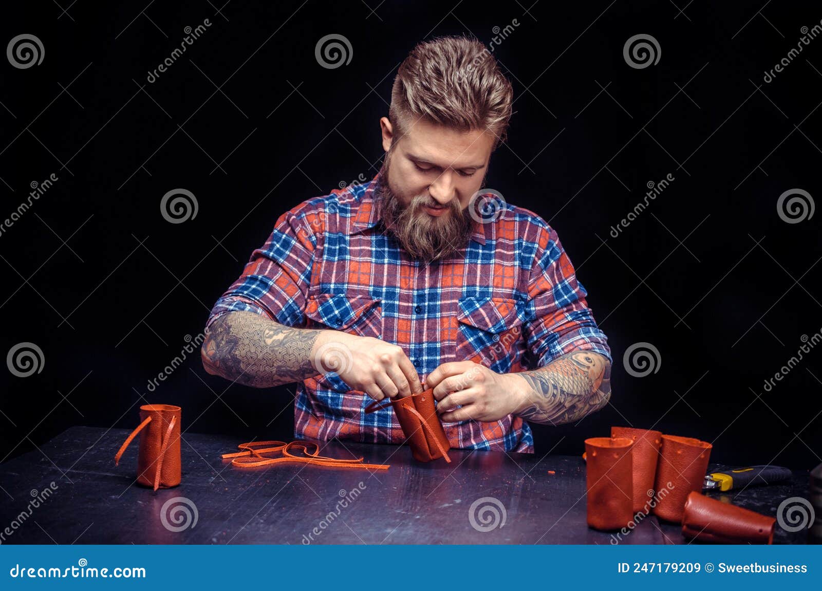 Leather Workman Creates Quality Product of Leather in His Shop Stock ...
