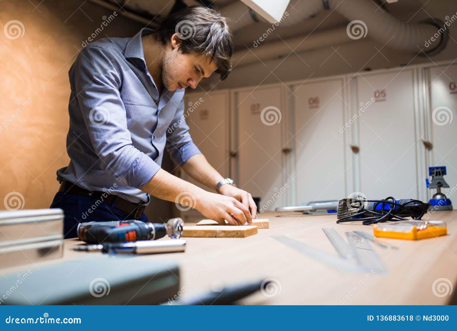 Handyman working with wood stock photo. Image of equipment - 136883618