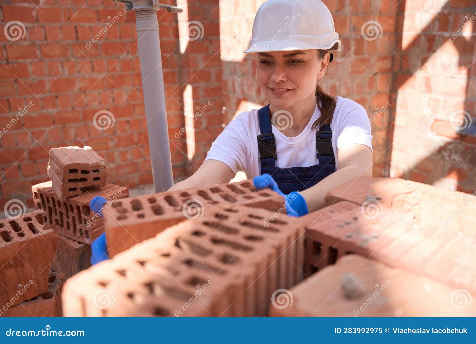 Handywoman Sorting Piles with Bricks, Preparing Material for Building ...