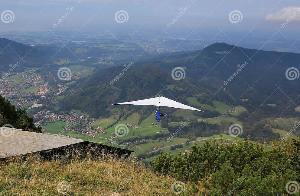 Hang Glider Flying in the German Alps Stock Image - Image of gliding ...