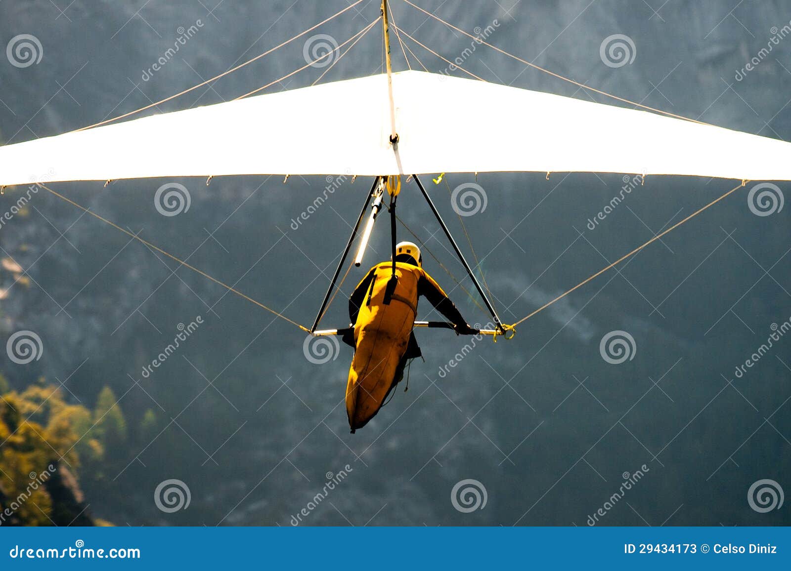 Hang-gliding over a valley stock image. Image of flying - 29434173