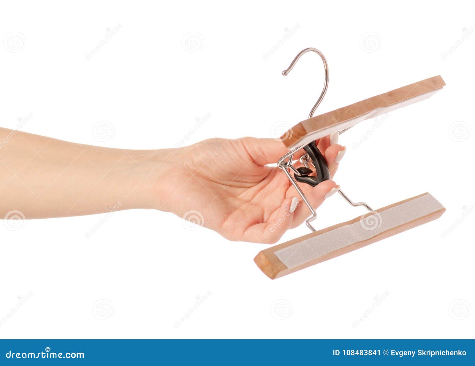 Hanger for pants in hand stock image. Image of accessory - 108483841