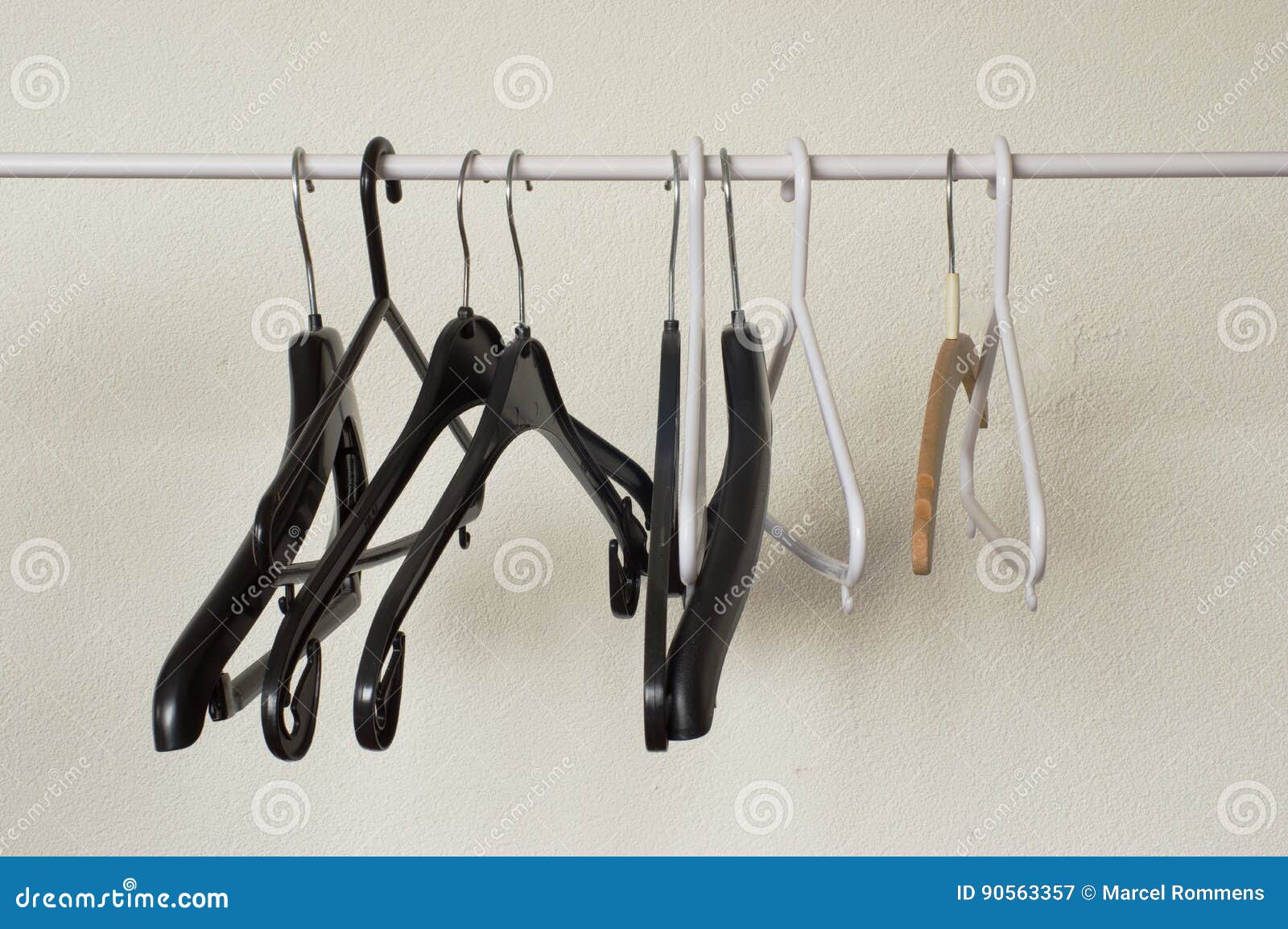 Hangers on rack stock image. Image of clothing, storage - 90563357