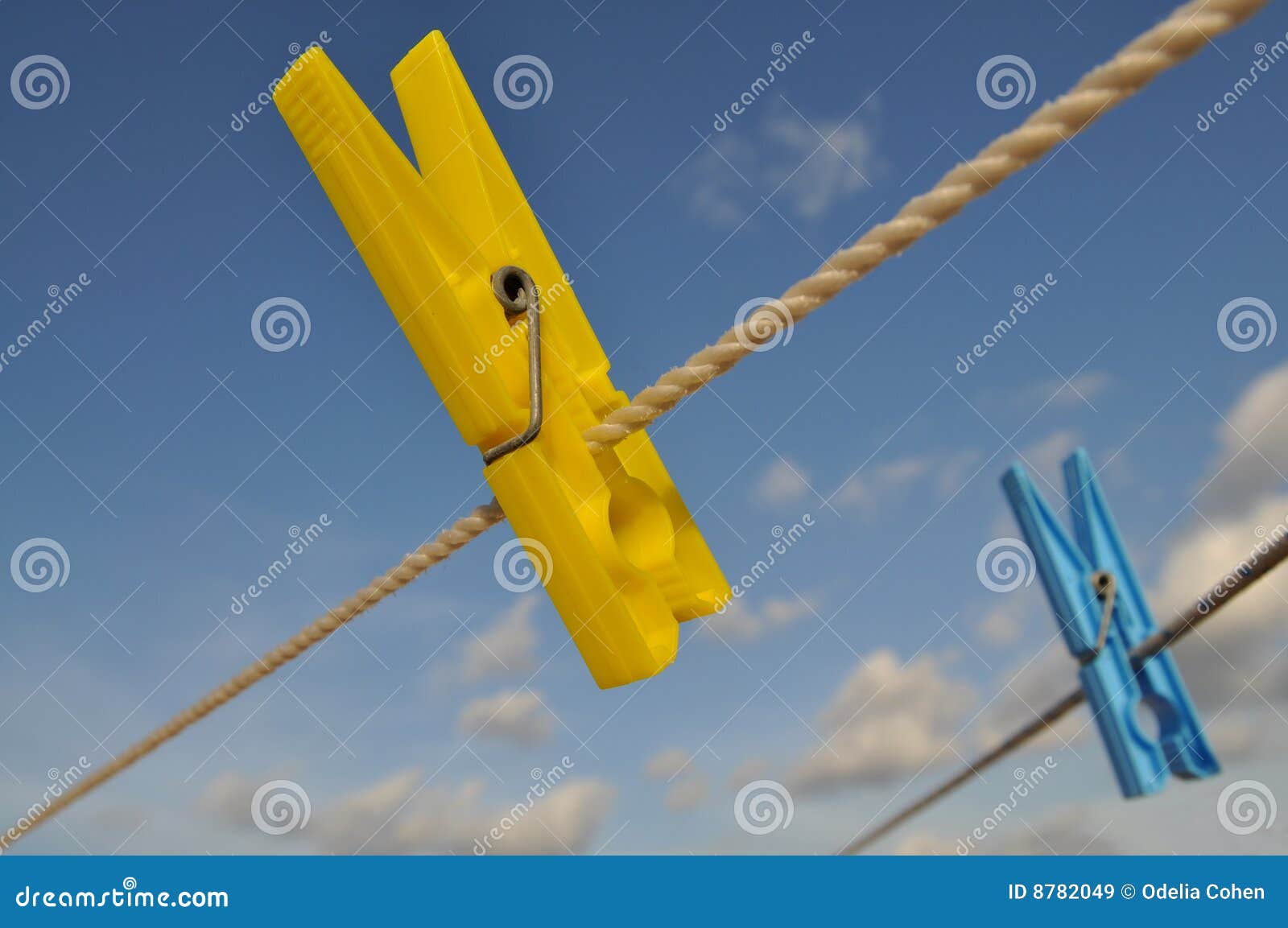 Hanging stock image. Image of hang, yellow, couple, blue - 8782049