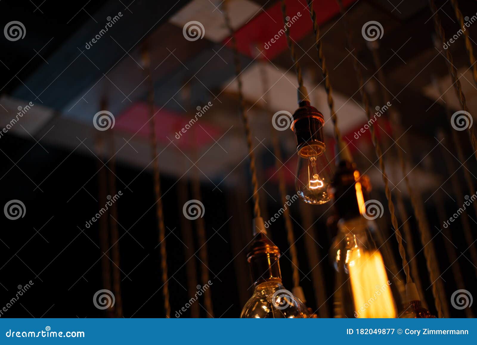 Hanging Array of Many Incandescent Light Bulbs Stock Image - Image of ...