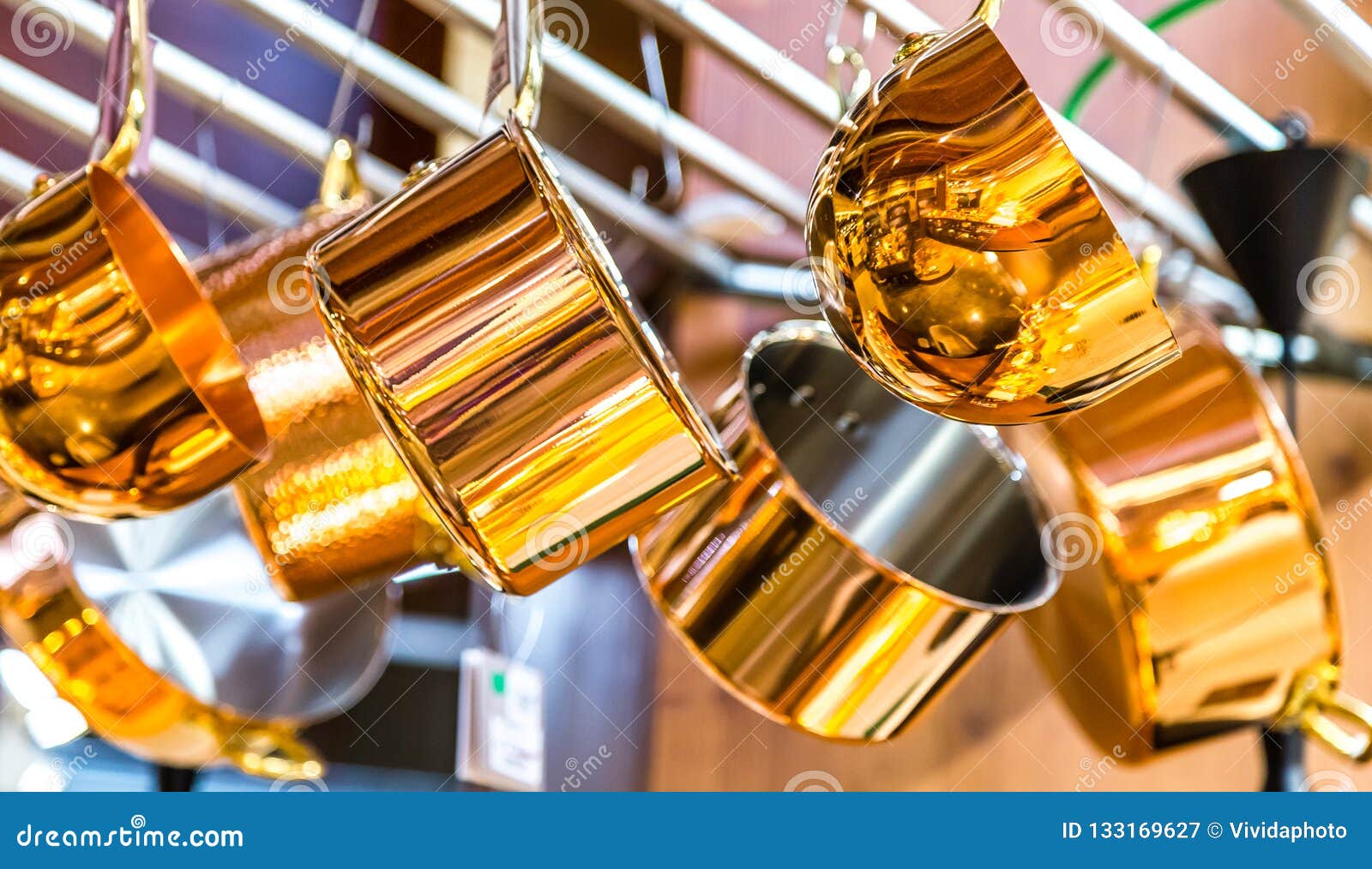 Hanging copper pots stock image. Image of metal, kitchen - 133169627
