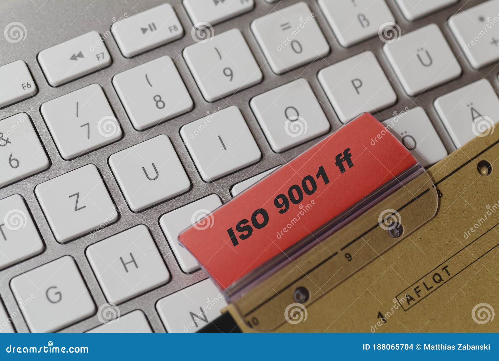 Hanging Folder with Red Label Where ISO 9001 is Called a European ...