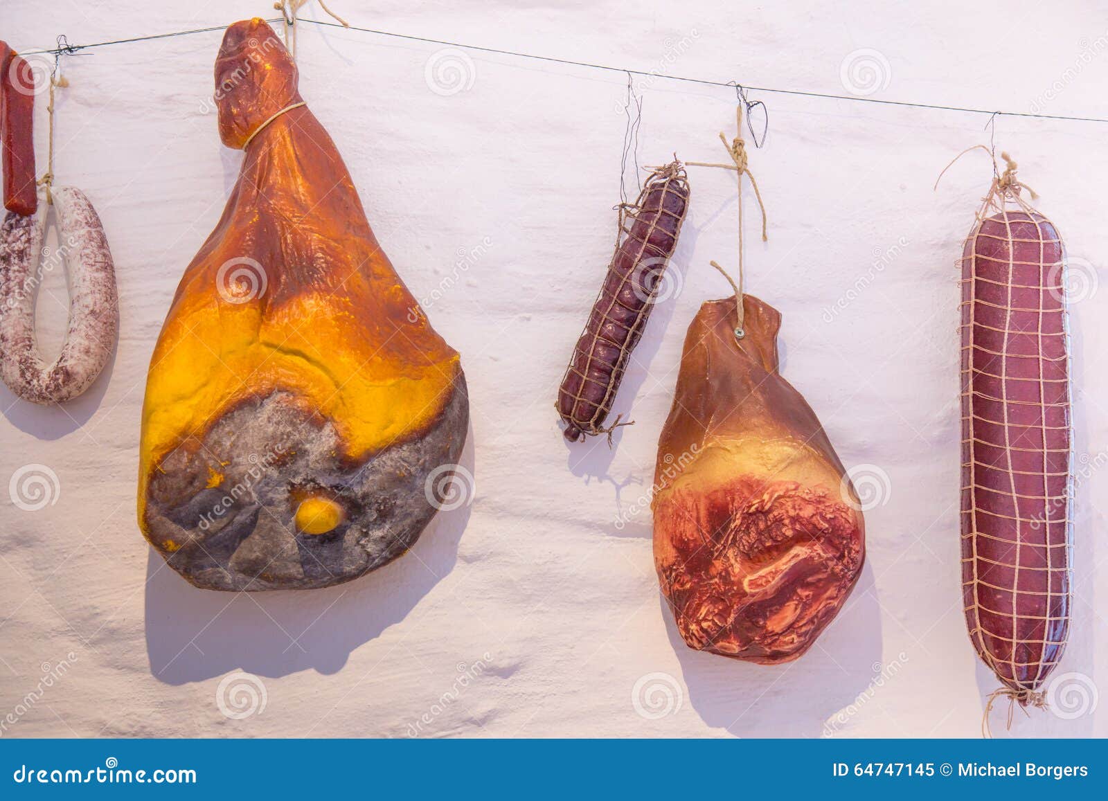 Hanging ham and meat stock image. Image of wall, bone - 64747145