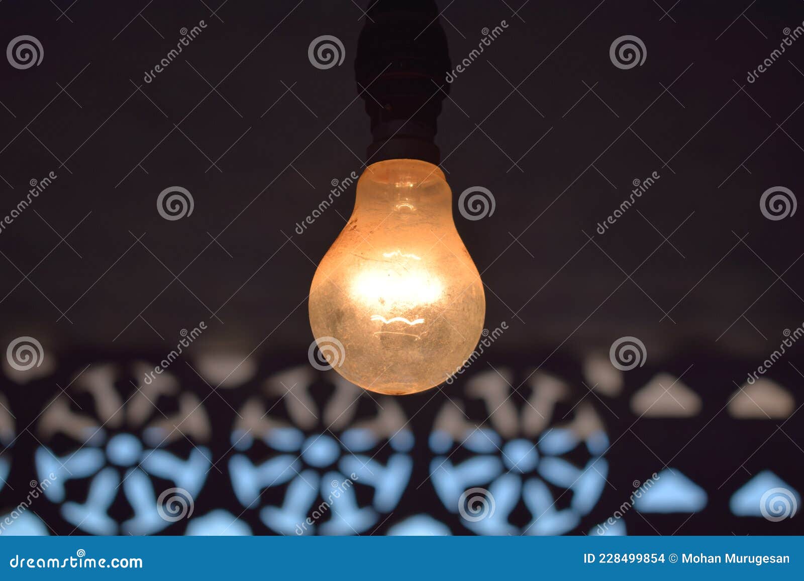 Hanging Incandescent Light Bulb Stock Photo - Image of energy ...