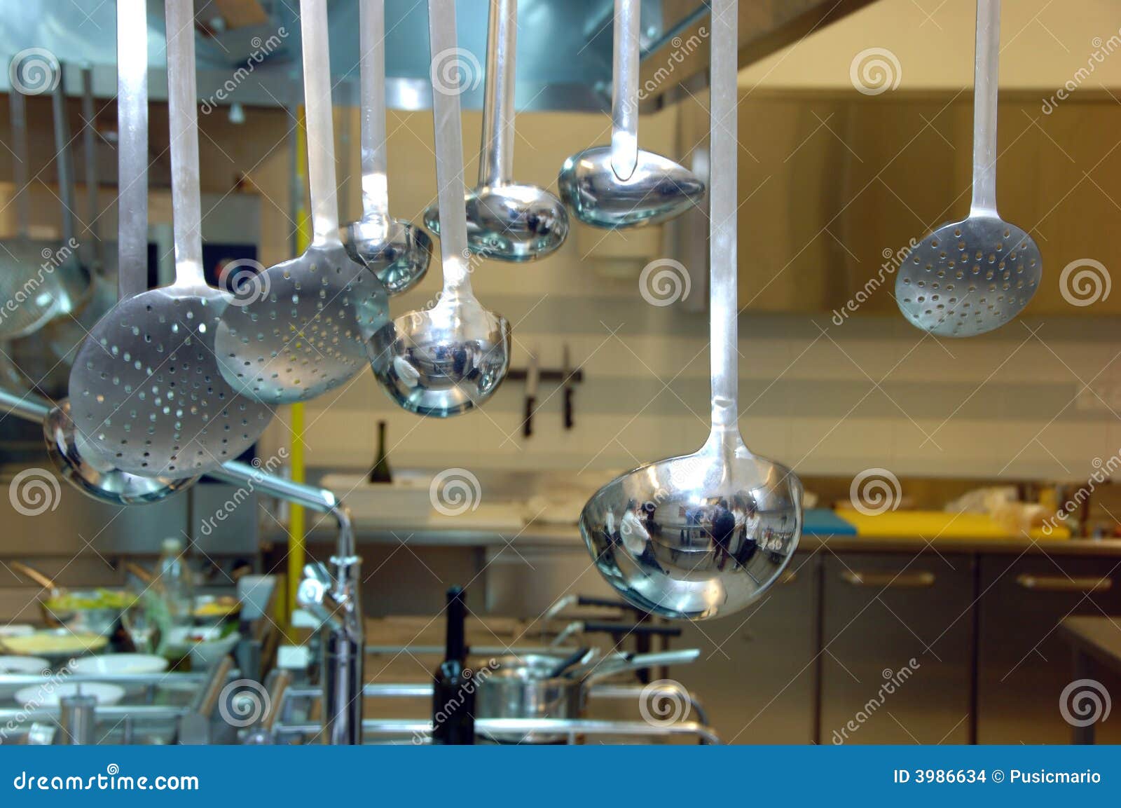Hanging Kitchen Utensils in the Kitchen Stock Photo - Image of design ...