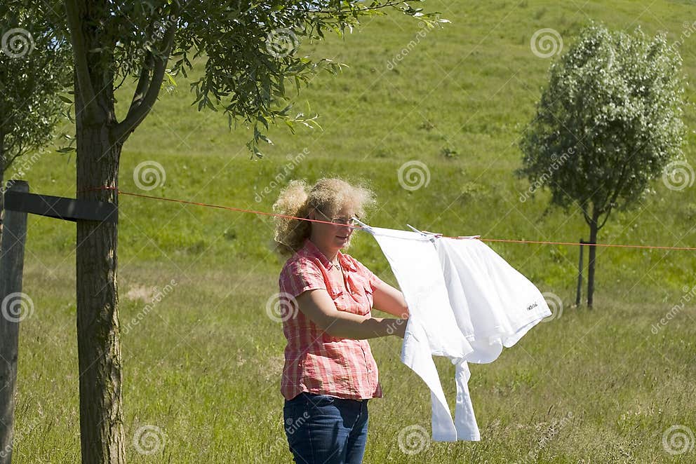 Hanging Laundry on the Line Stock Photo - Image of female, nature: 9804004