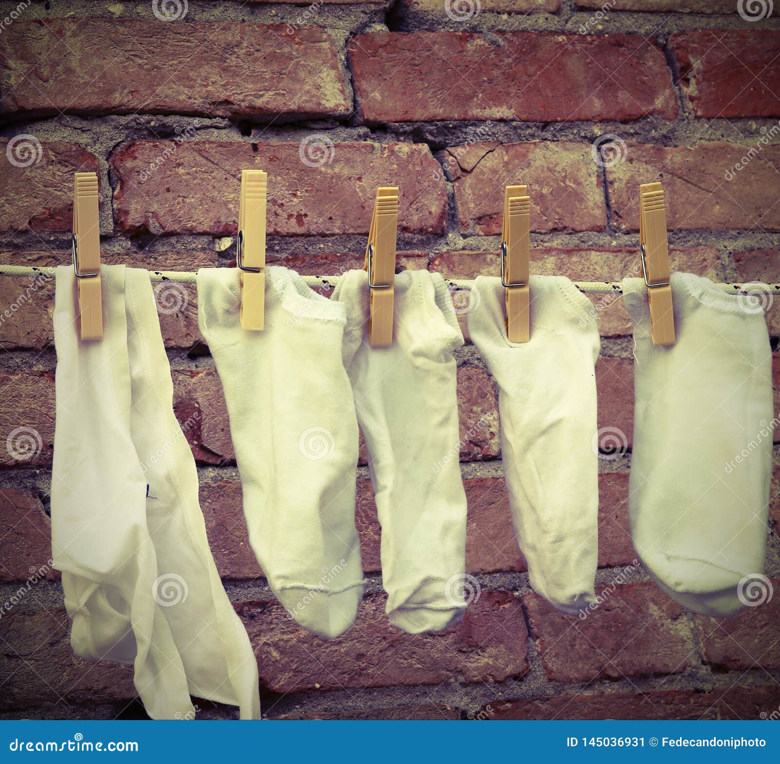 Hanging laundry out to dry stock image. Image of clean - 145036931