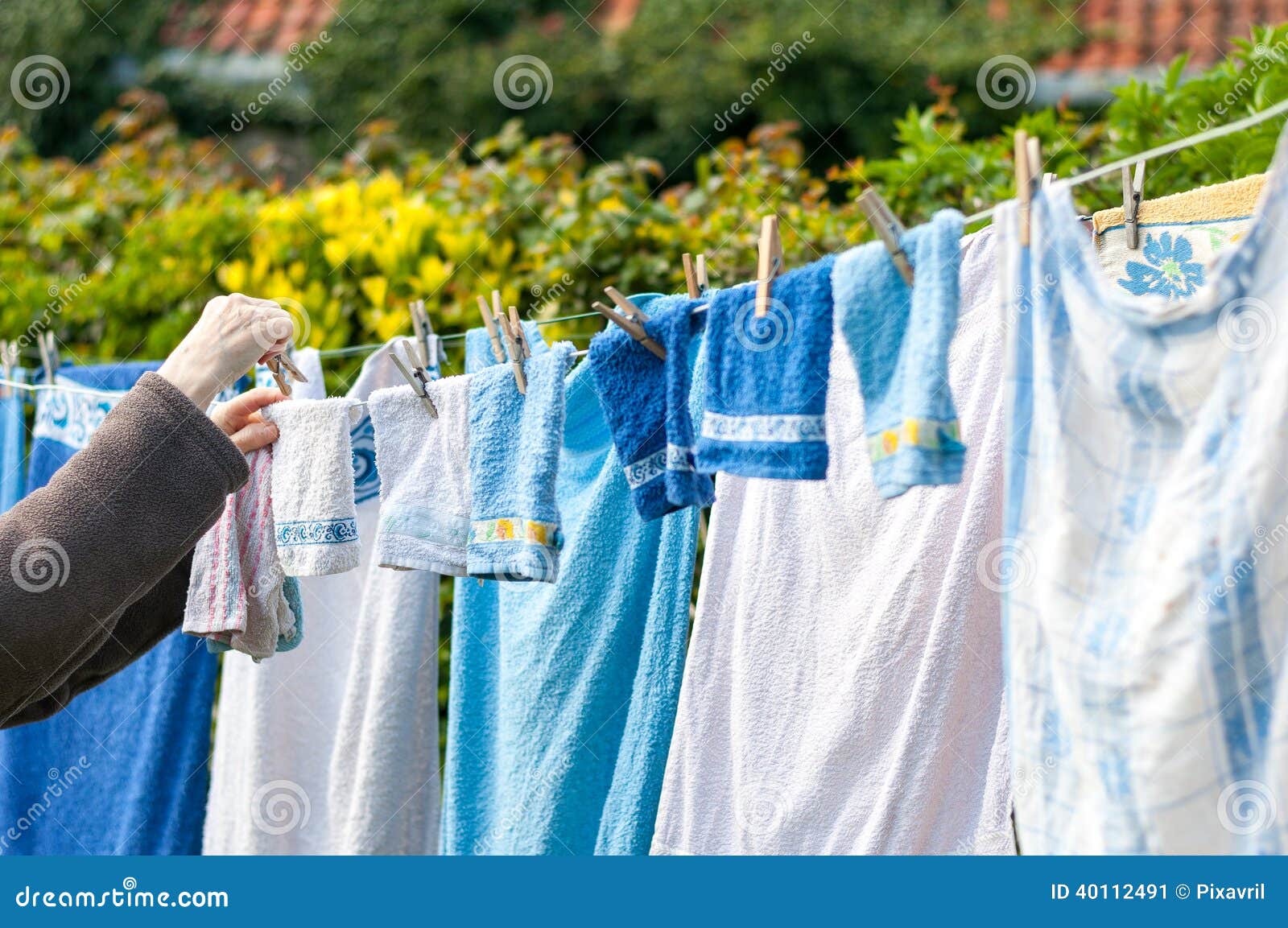 Hanging laundry outdoor stock image. Image of putting - 40112491