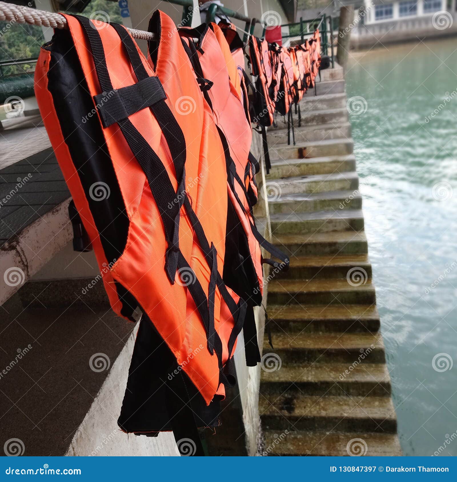 Hanging Life Jacket on the Rope Stock Image - Image of rope, vest ...