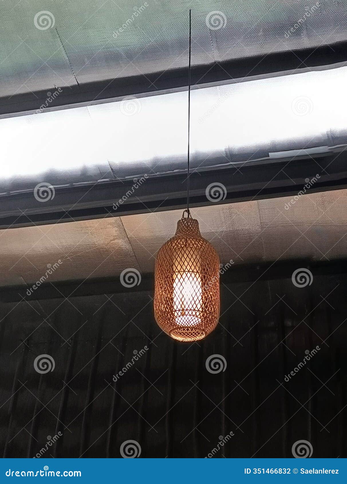 Hanging Light Bulb in a Cafe. Stock Photo - Image of reflection ...