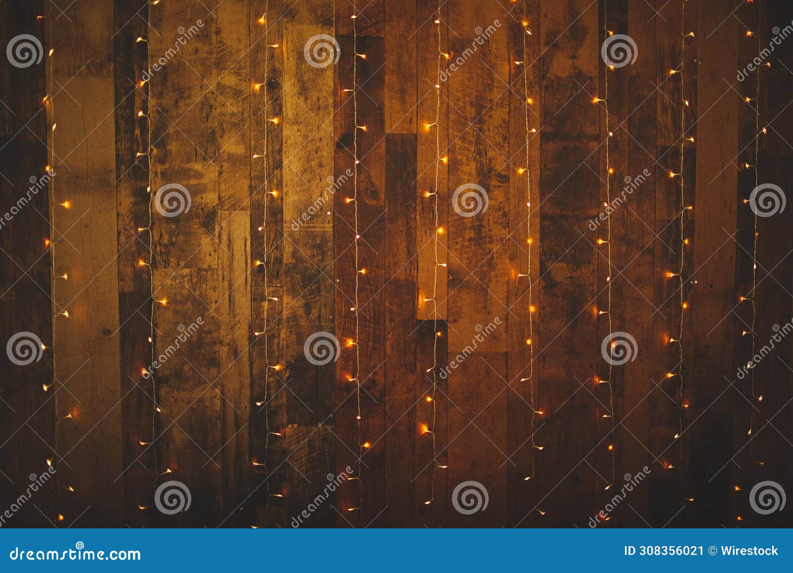 Lights Hanging Down from the Side of a Wall on a Dark Background Stock ...