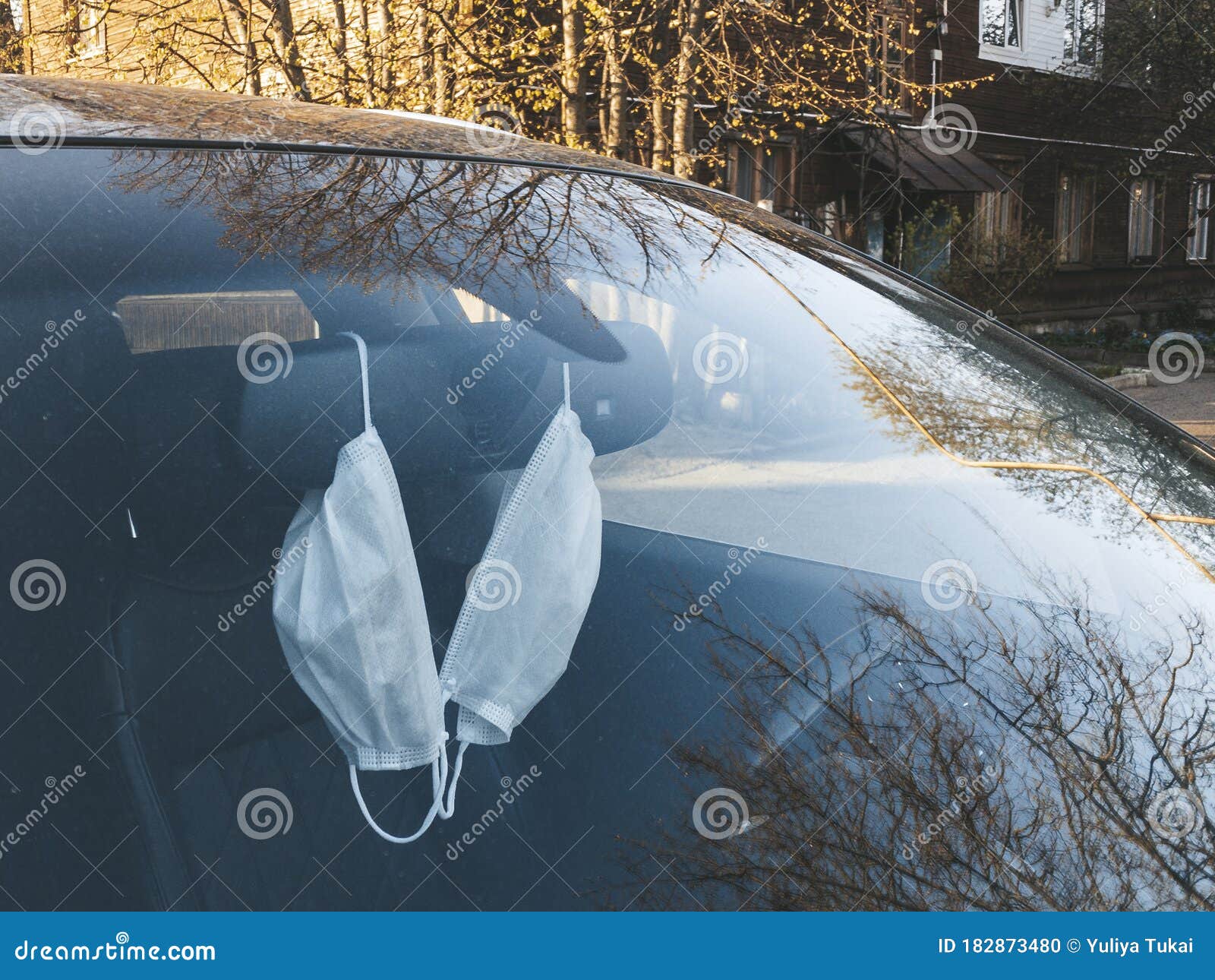 Hanging Masks in a Car Behind a Windshield Stock Photo - Image of ...