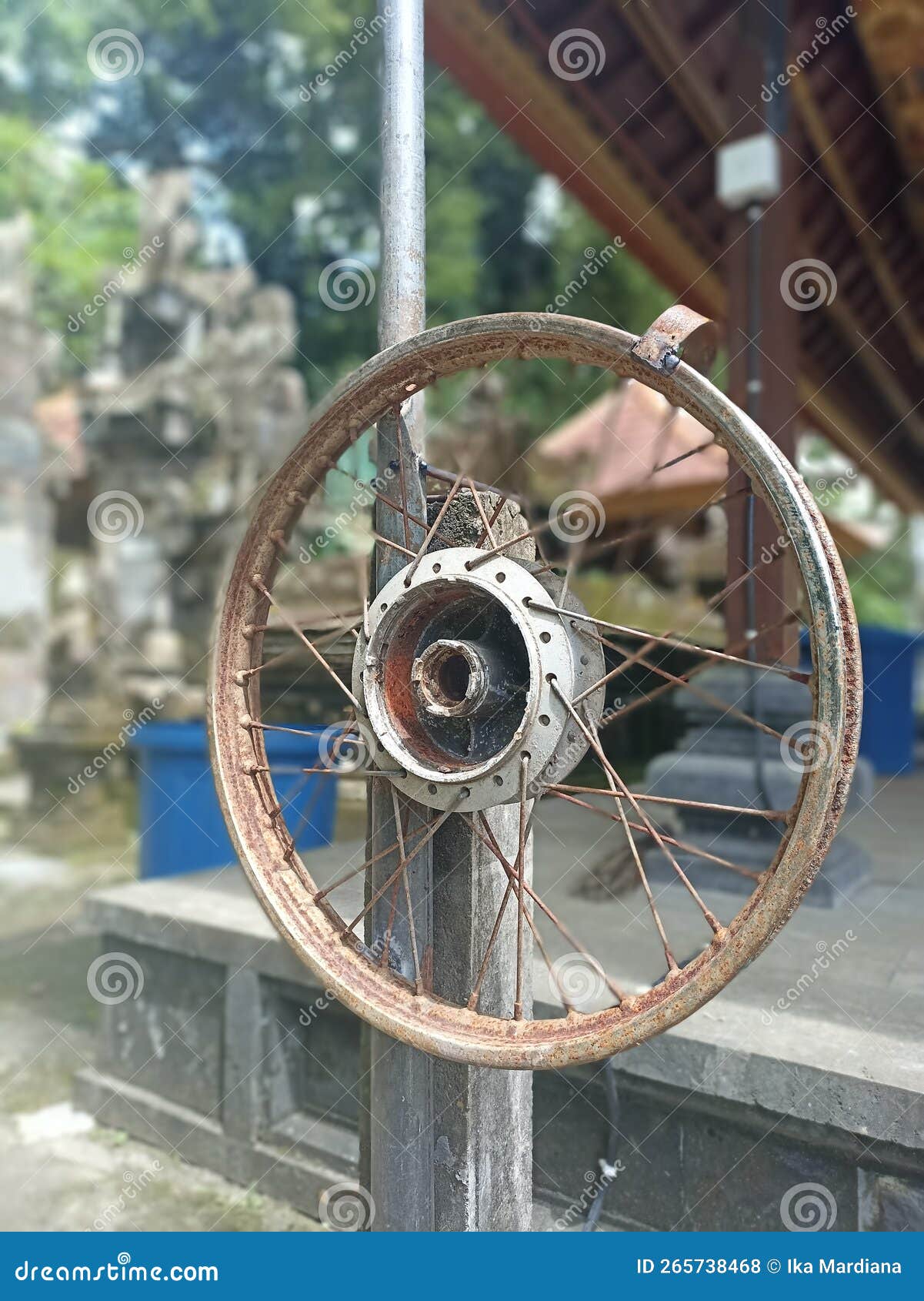 Hanging Old Vintage Rusty Wheels at the Temple Stock Photo - Image of ...