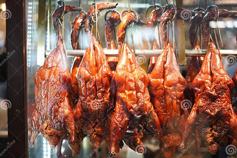 Hanging Roast Ducks on a Rack Stock Photo - Image of food, chickens ...
