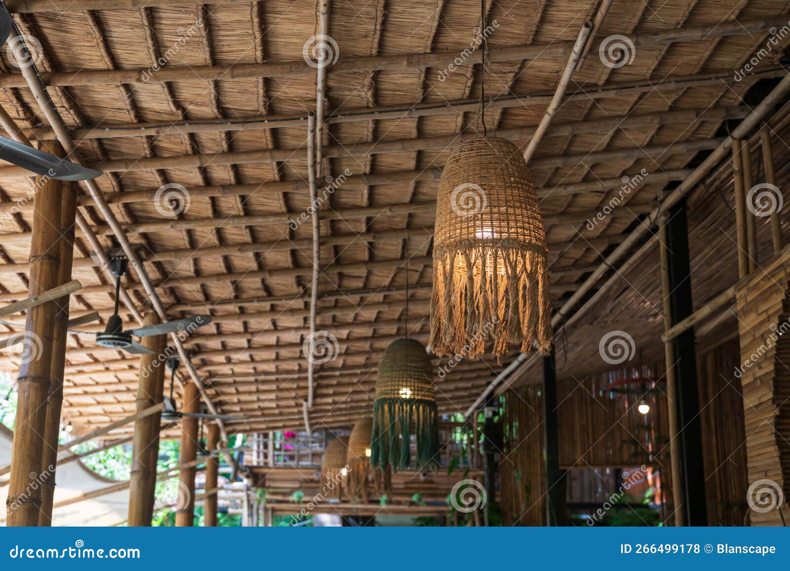 Hanging Rope Lamp with Light Bulb on Wooden Ceiling in Cafe Stock Photo ...
