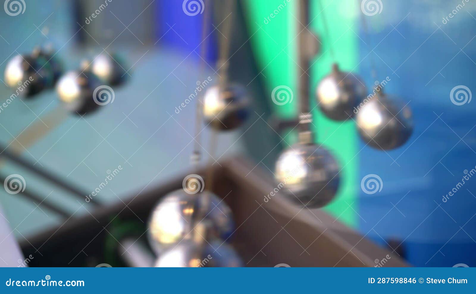 Hanging Steel Balls in Regular Motion Displayed in the Science and ...