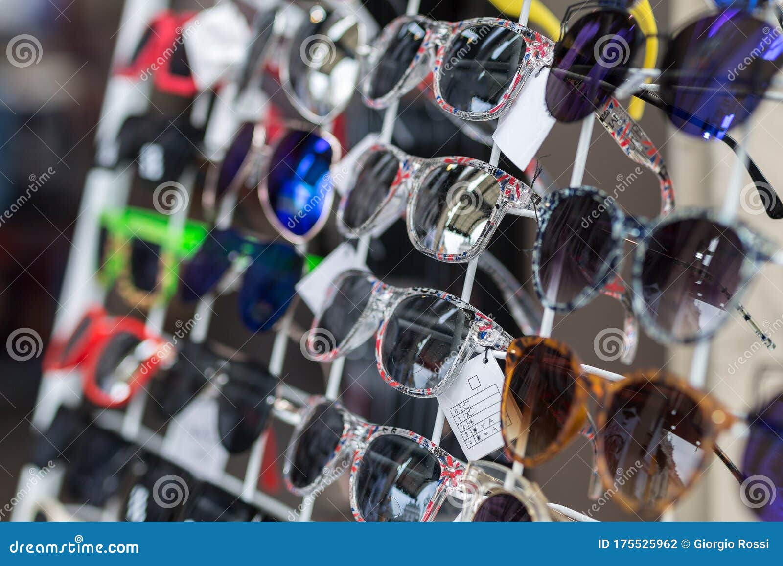 Hanging Sunglasses on Display in a Store Stock Photo - Image of hanging ...