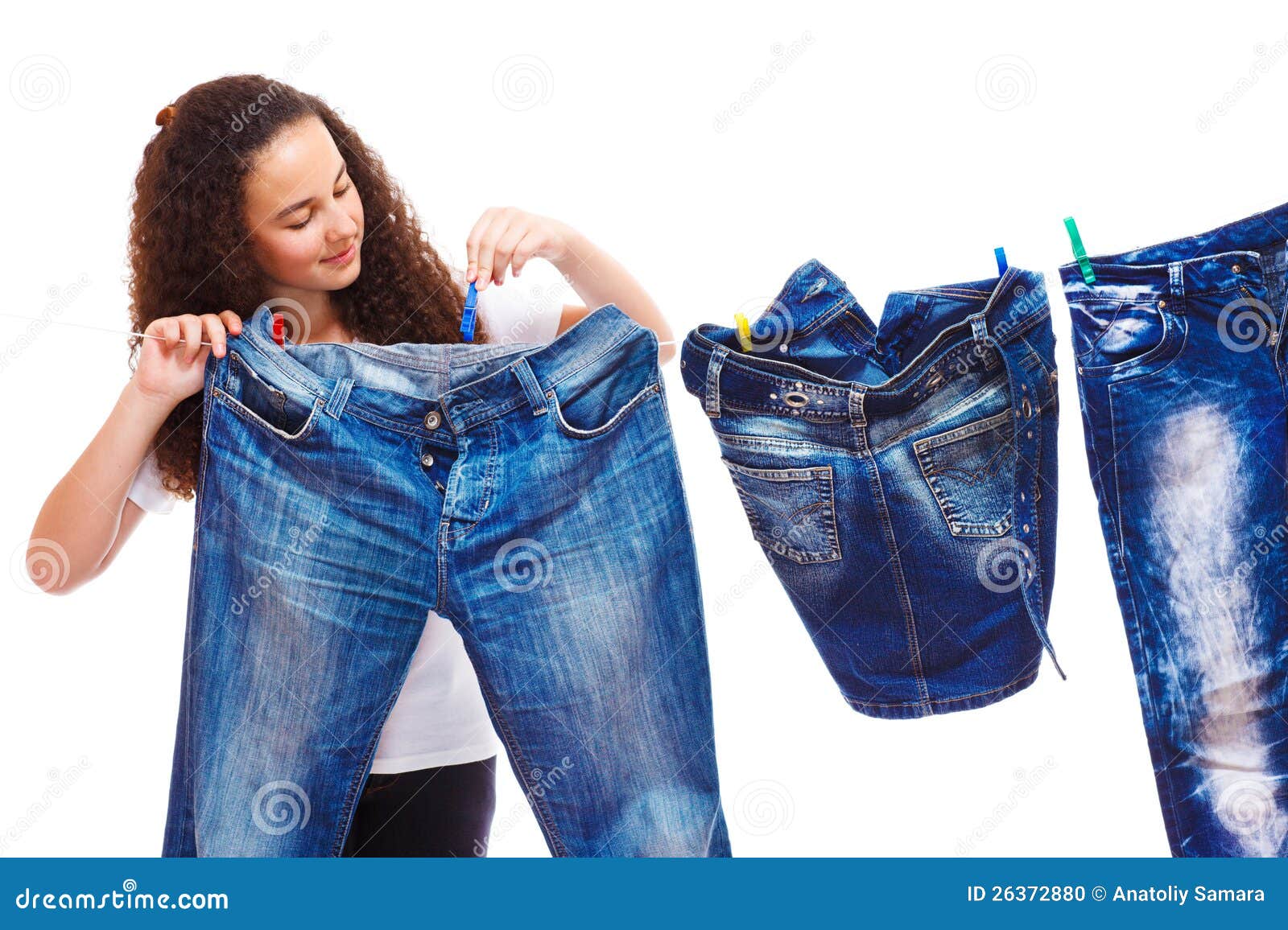 Hanging up denim clothes stock photo. Image of attractive - 26372880