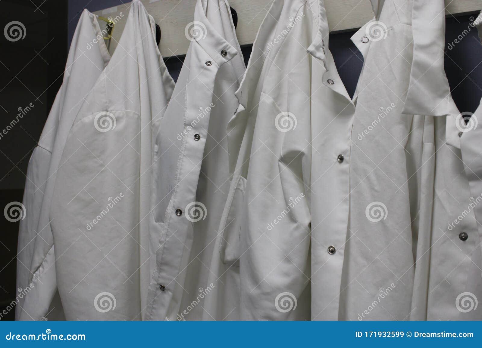 Hanging White Lab Coats stock image. Image of care, laboratory - 171932599