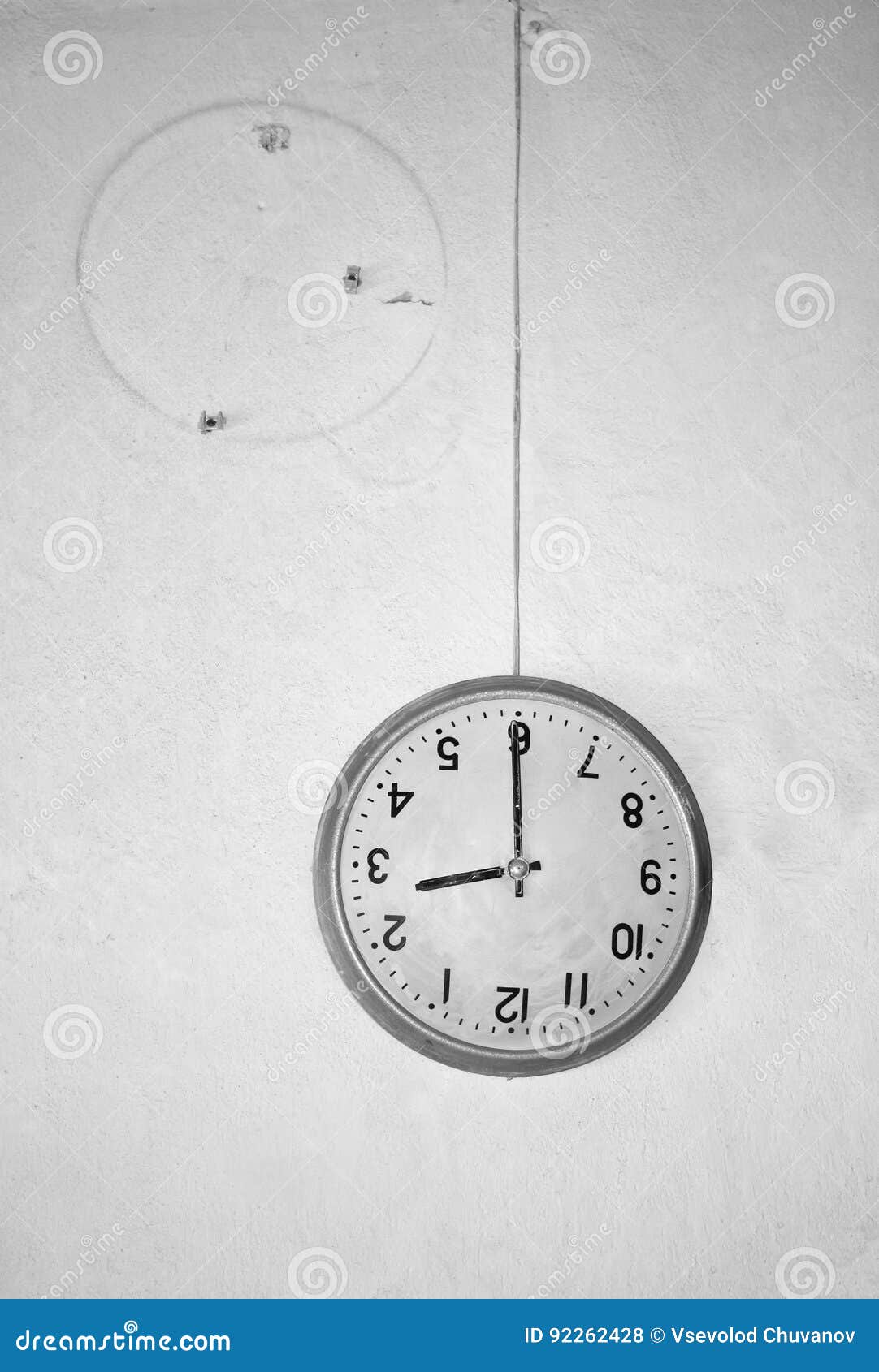 Hanging on the Wire Runaway Wall Clock Stock Photo - Image of circular ...