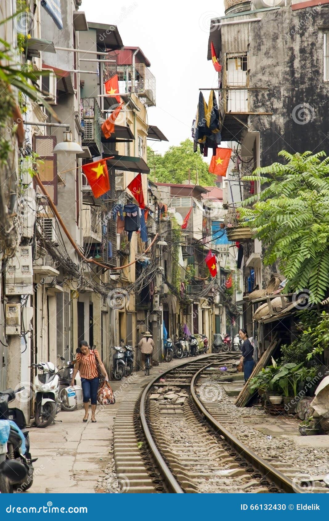 HANOI, VIETNAM - MAY 2014: Train Passing through Slums Editorial Image ...