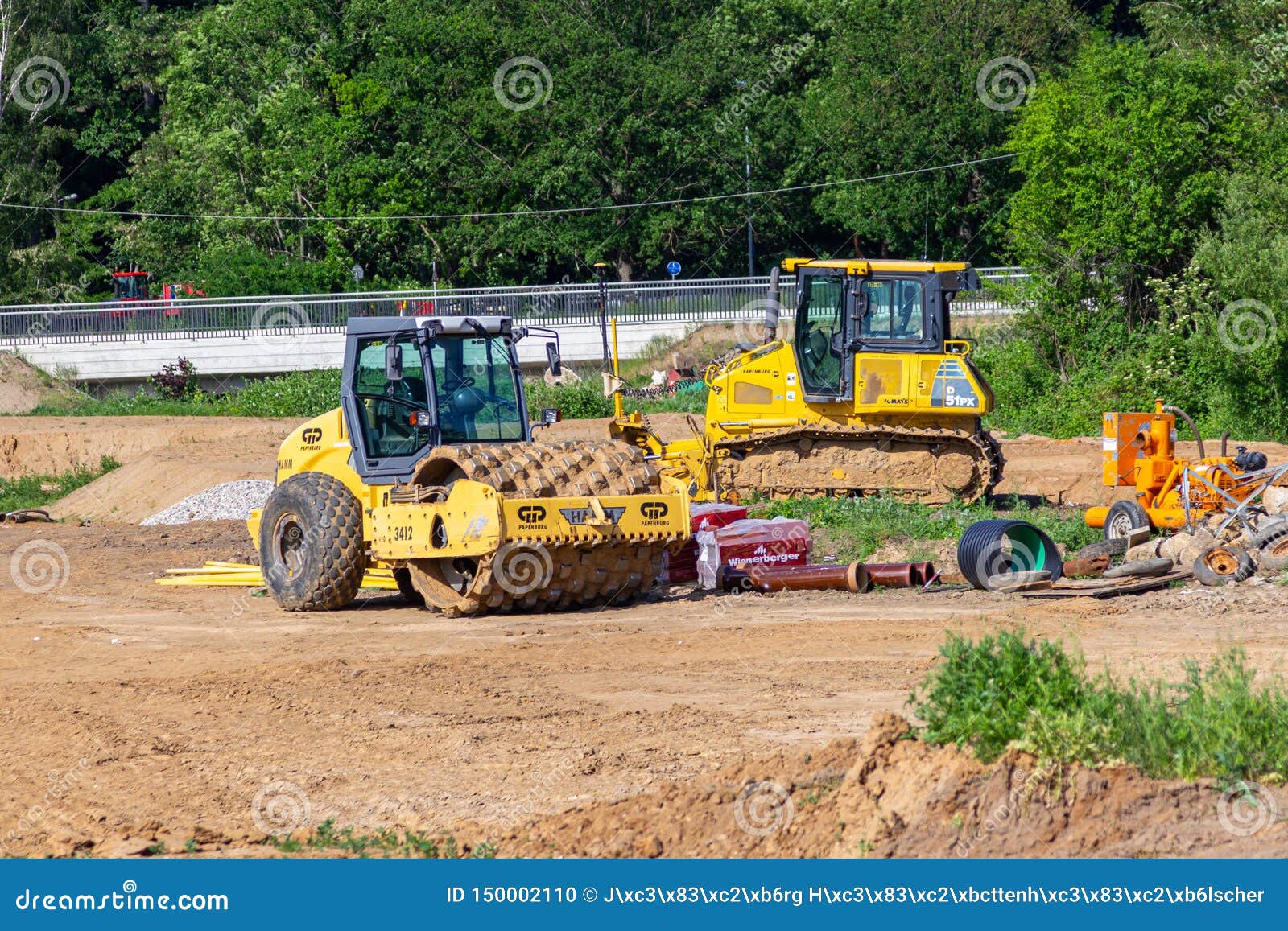 Yellow Construction Vehicles Stands on a Construction Site Editorial ...