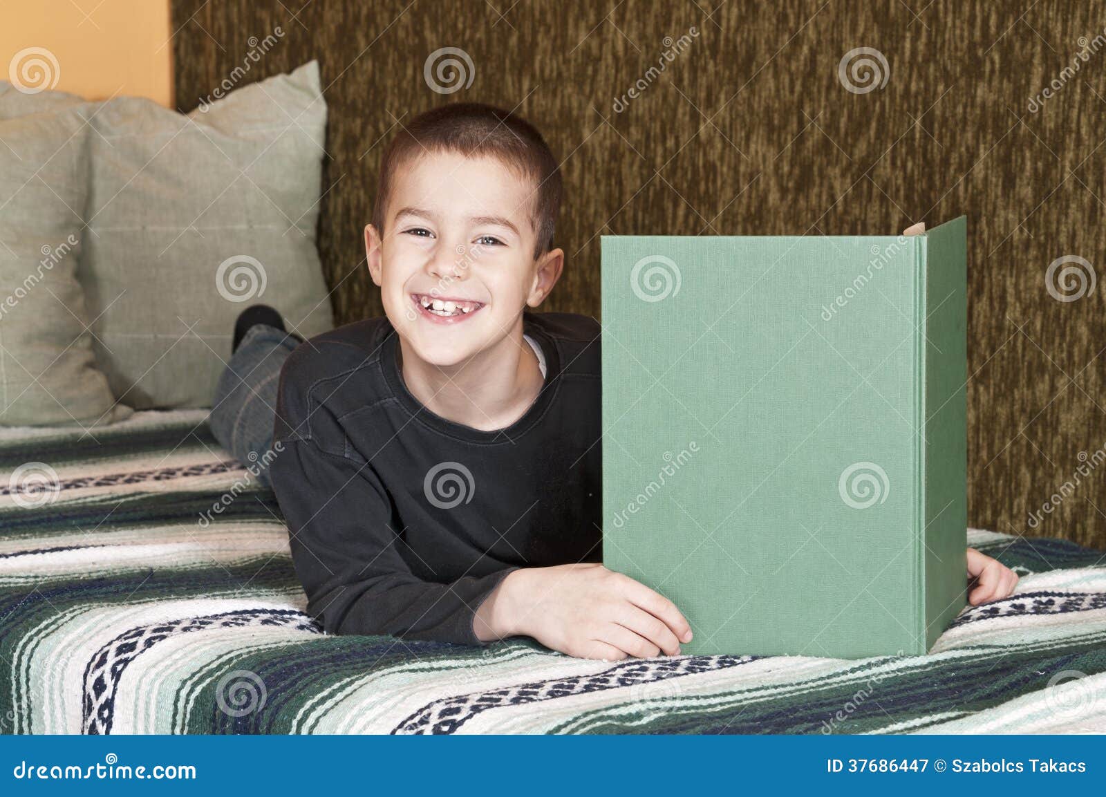 Happily boy reading book stock image. Image of expressing - 37686447