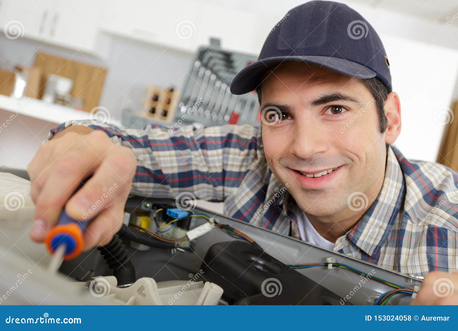 Happu man fixing machine stock photo. Image of defect - 153024058