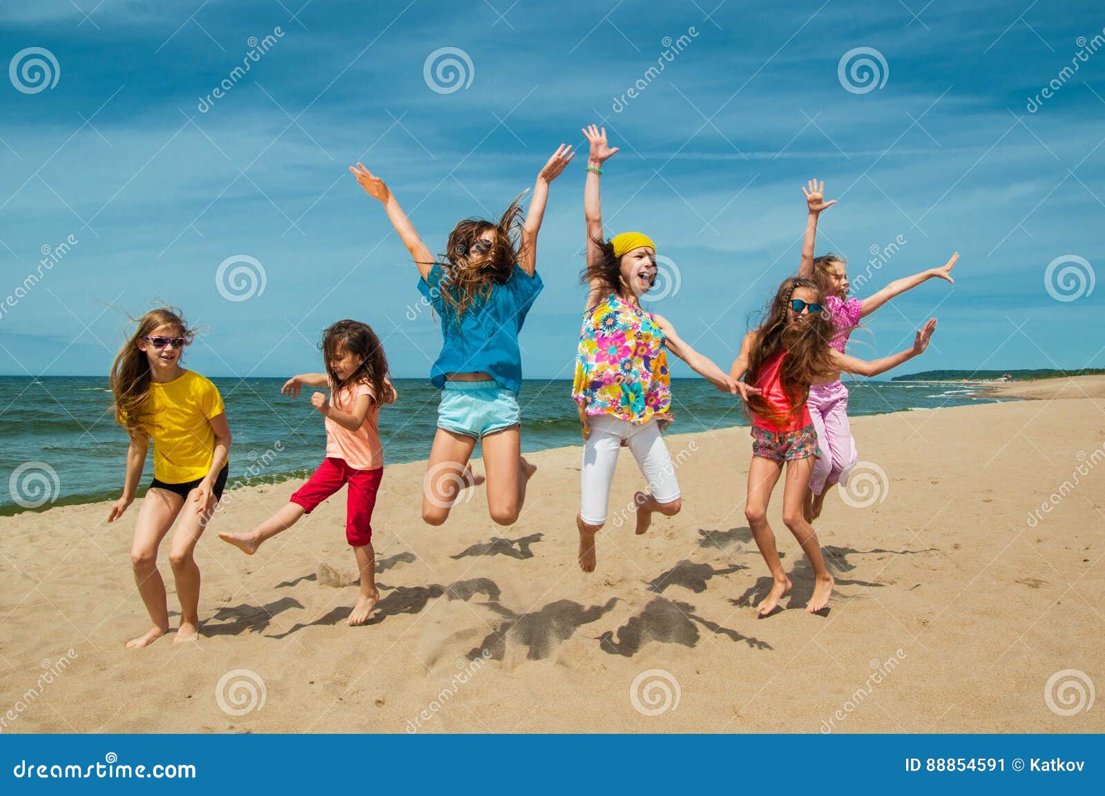 Happy Active Children Jumping on the Beach Stock Image - Image of ...