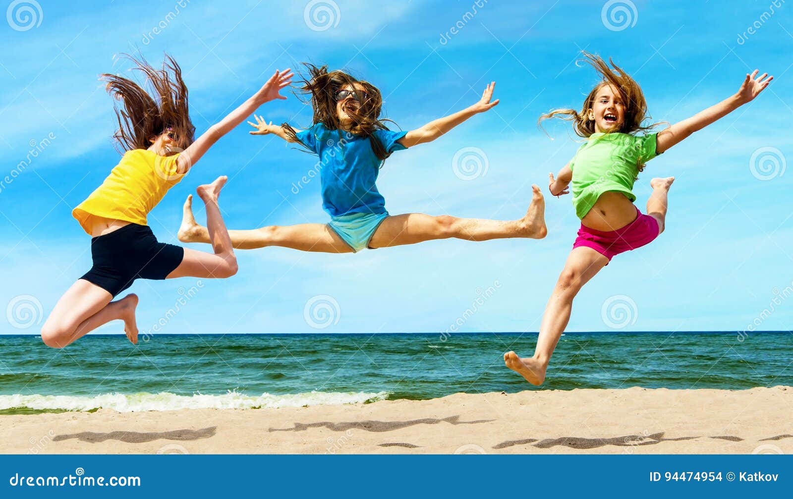 Happy Active Childrenl Jumping at the Beach Stock Photo - Image of hand ...