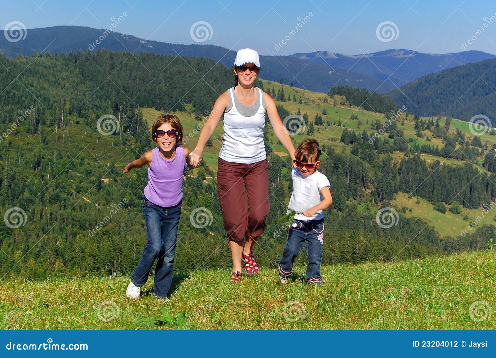 Happy Active Family on Summer Vacation in Mountain Stock Photo - Image ...